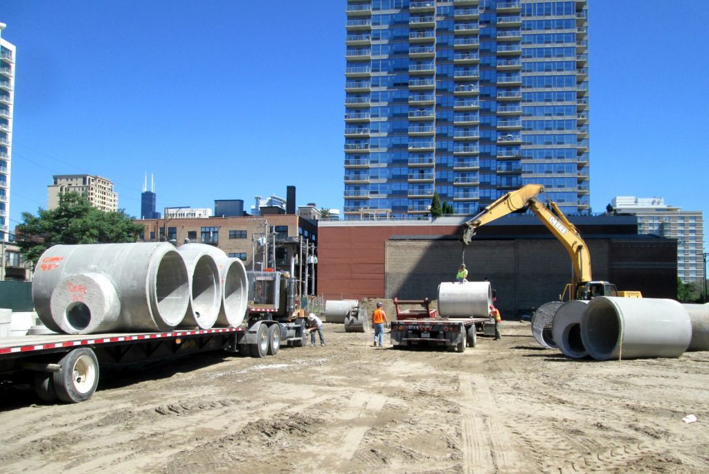 Summit Design + Build starts work on 55 South Loop townhouses in nine ...